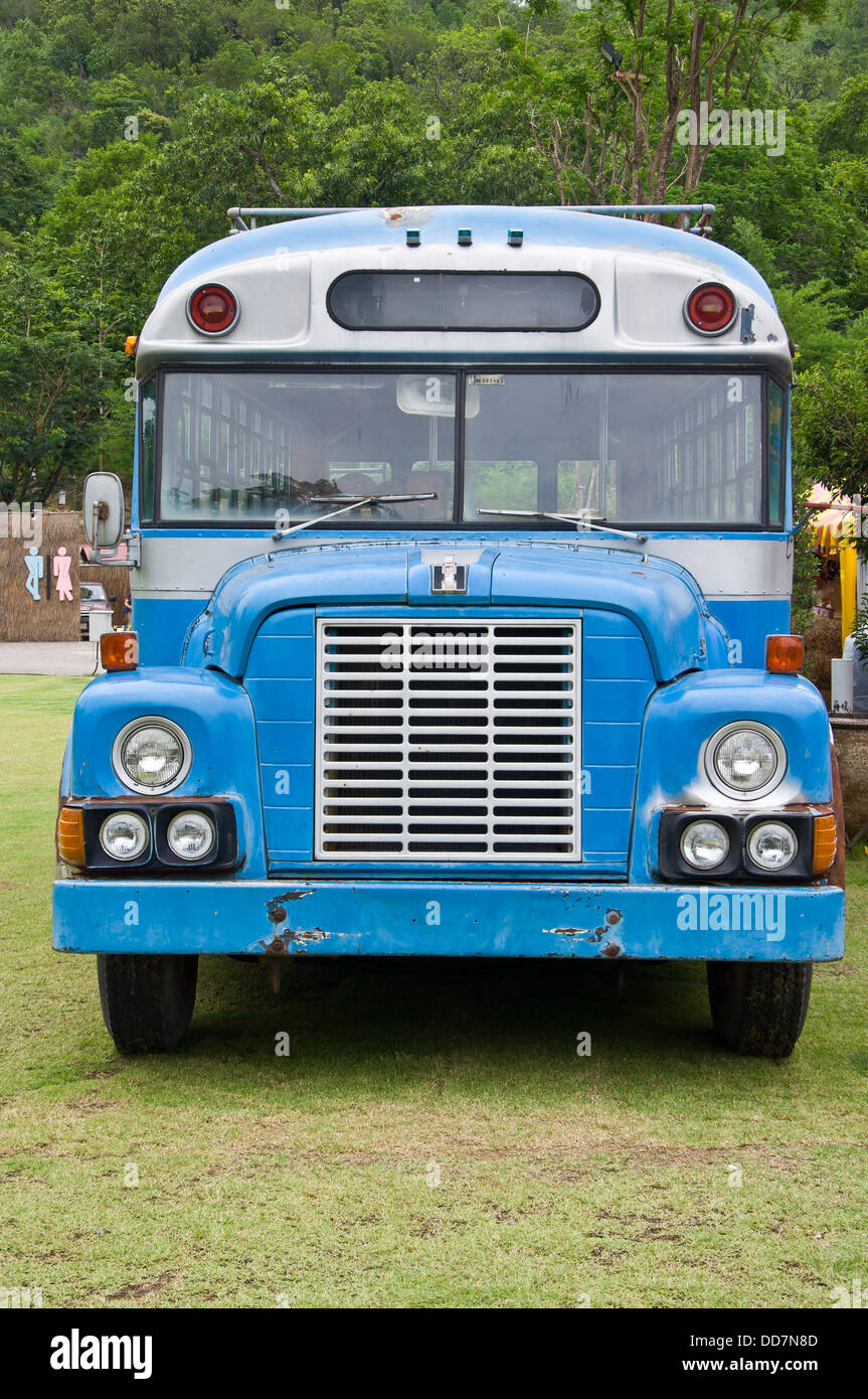 old blue school bus in garden Stock Photo - Alamy
