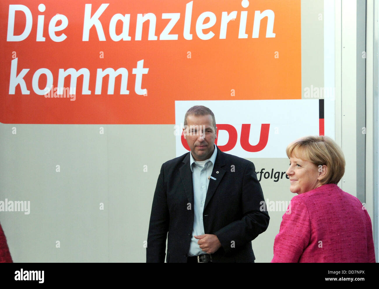 Rendsburg, Germany. 27th Aug, 2013. German Chancellor Angela Merkel (R ...