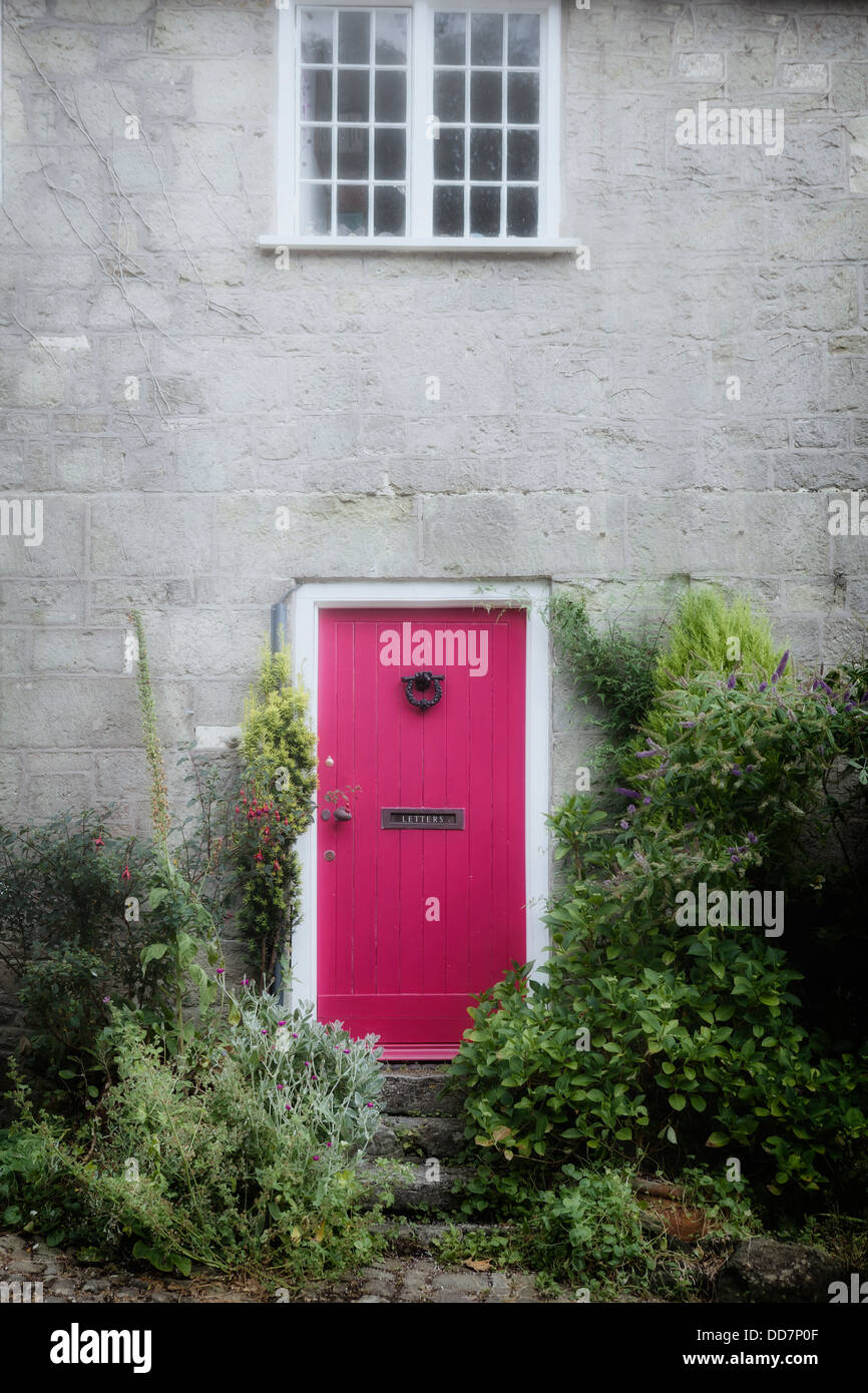 Old building pink flowers hi-res stock photography and images - Alamy