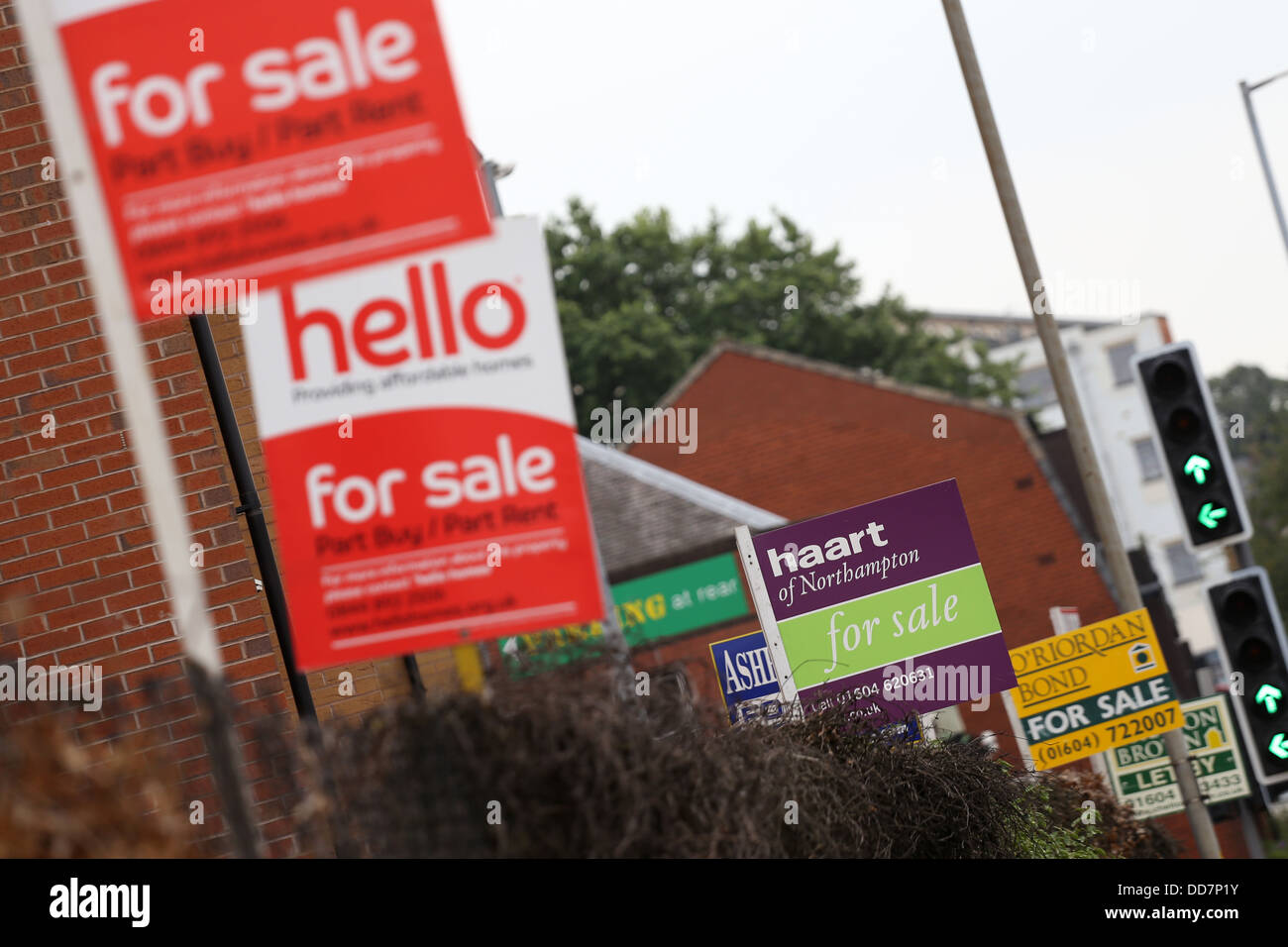 For sale signs outside flats Stock Photo - Alamy