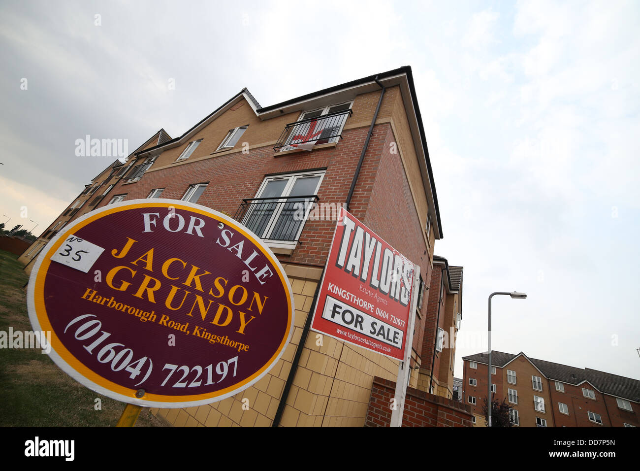 For sale signs outside flats Stock Photo - Alamy