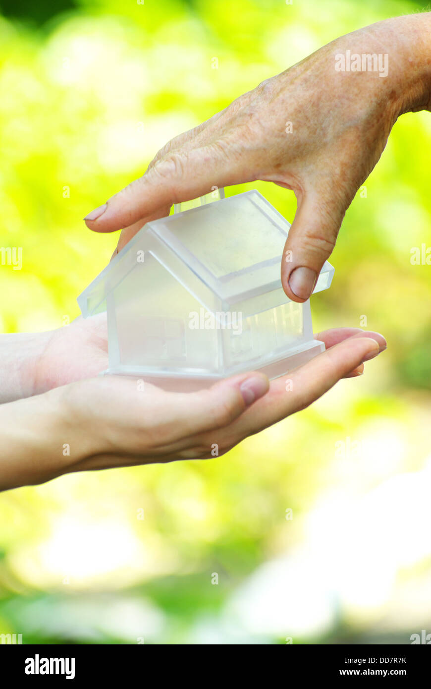 house in hands Stock Photo - Alamy