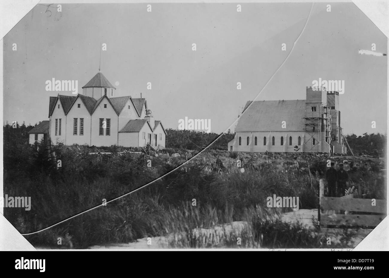 A photograph depicting the construction of a town hall and a church ...