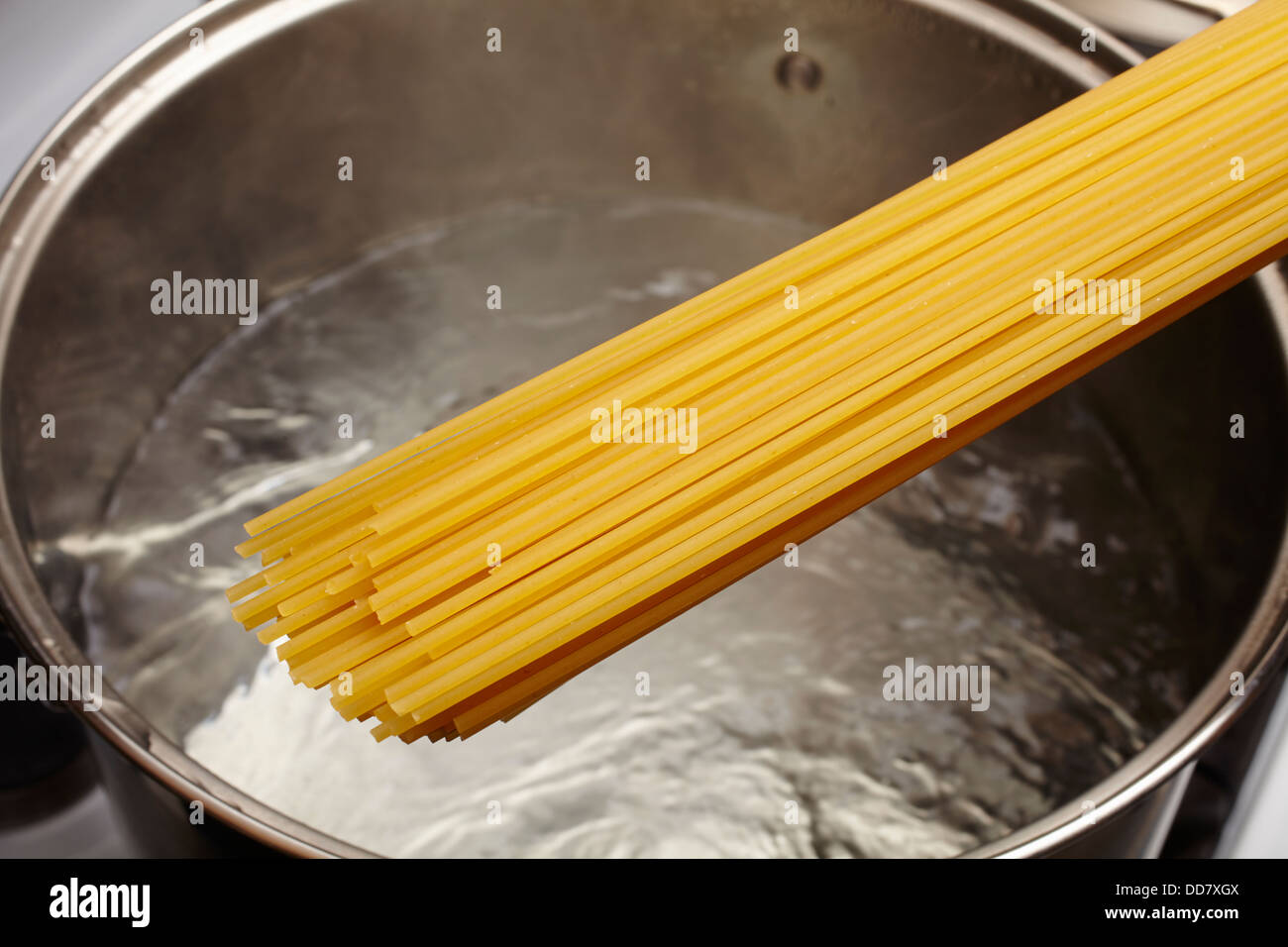 Cooking with pasta hi-res stock photography and images - Alamy