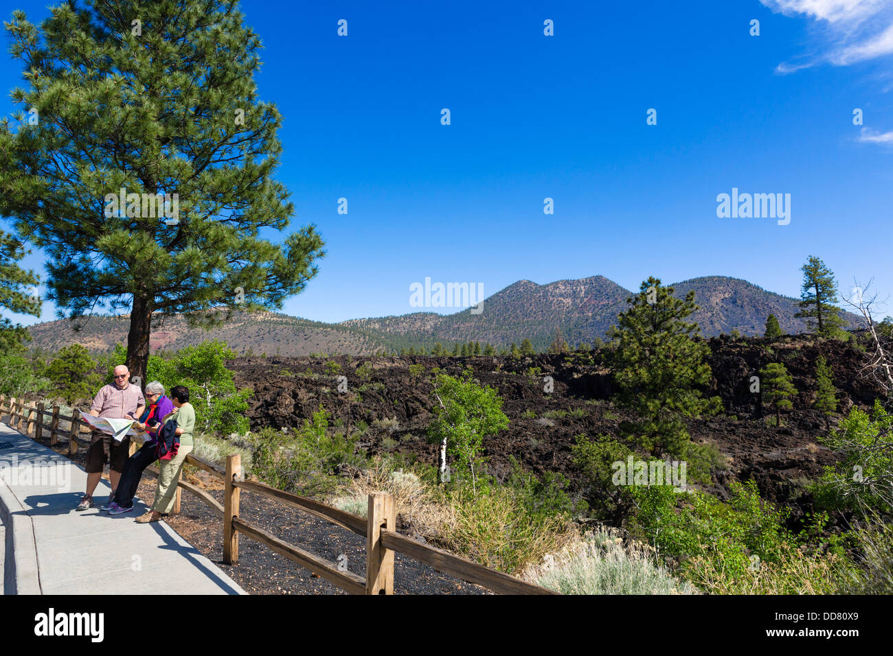 Tourists at a viewpoint overlooking the Bonito Lava Flow, Sunset Crater ...