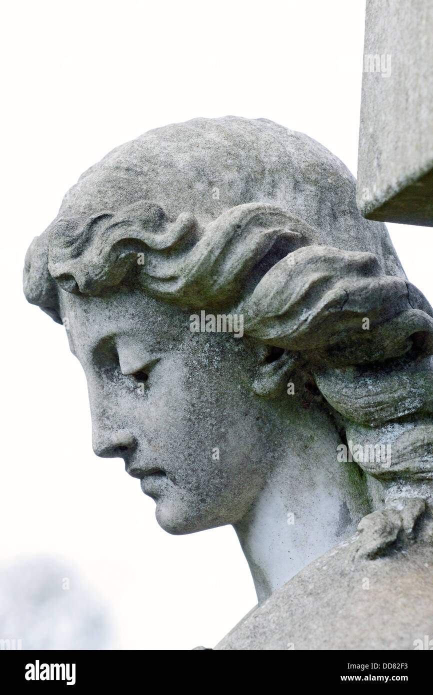 Detail of a sculptured head of a funereal Angel Stock Photo - Alamy