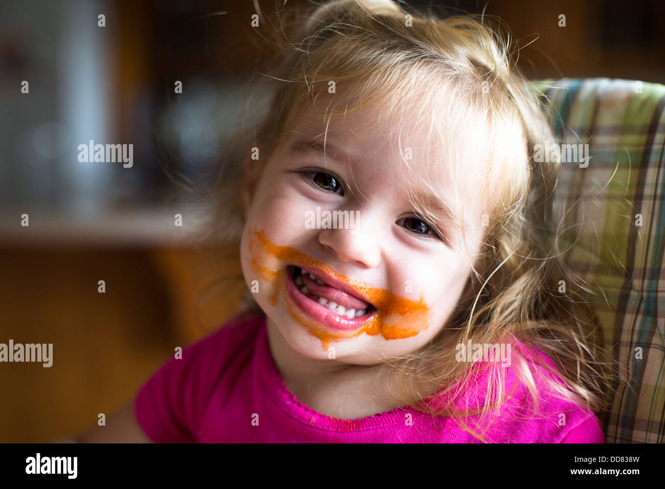 Baby girl finished eating her food and left big mess around her mouth ...