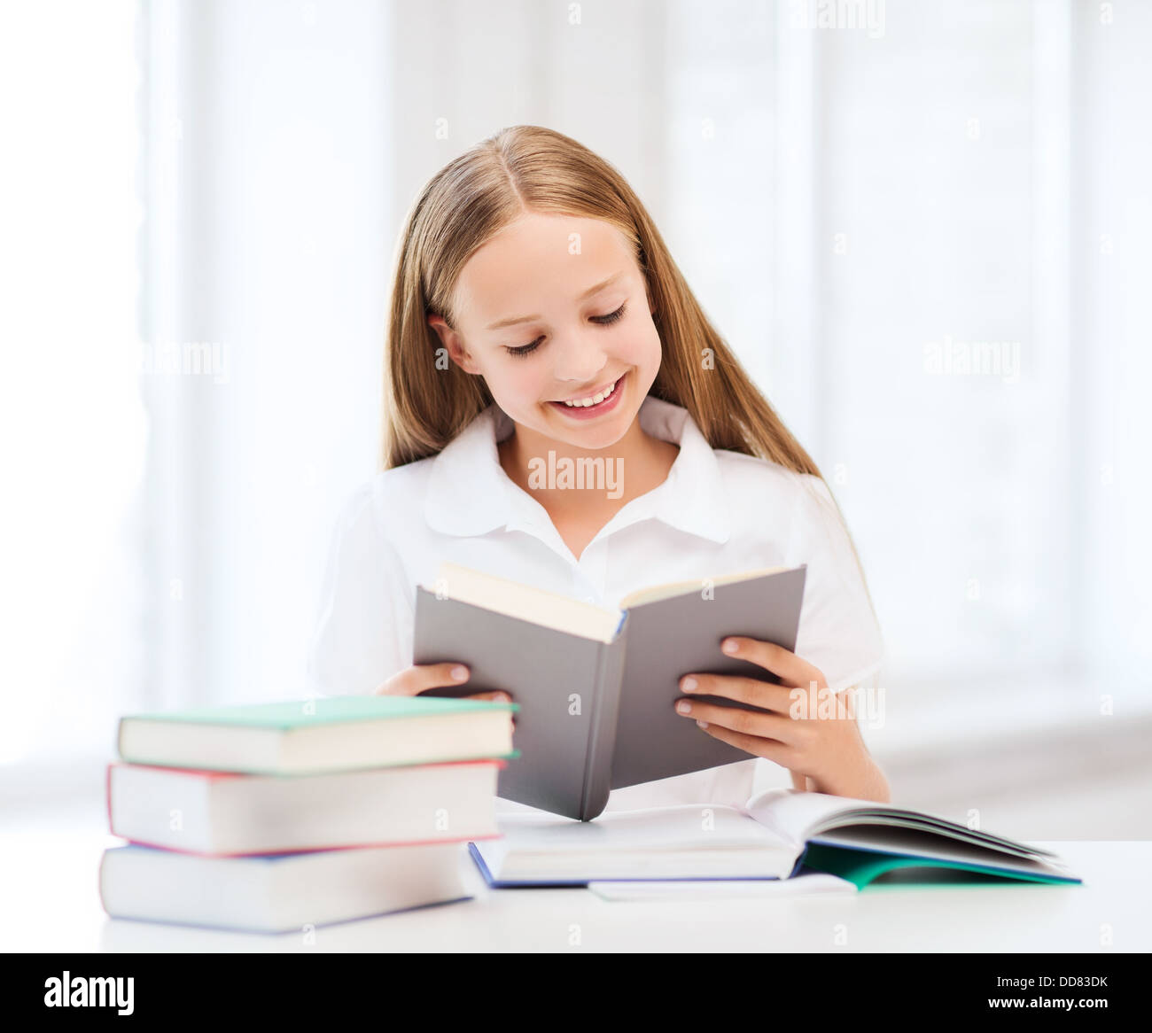 student girl studying at school Stock Photo - Alamy