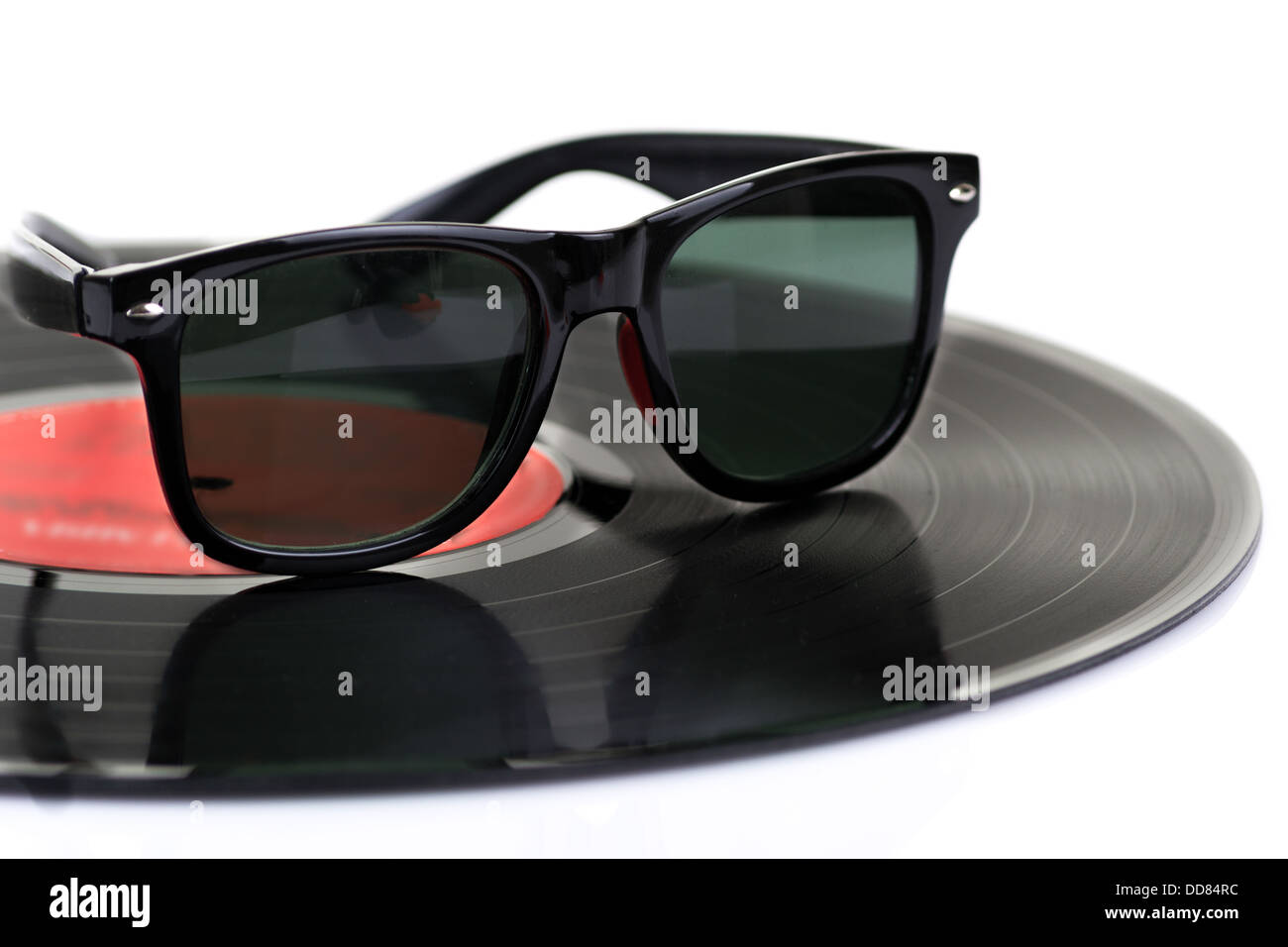 Vinyl disc LP with sunglasses Stock Photo - Alamy