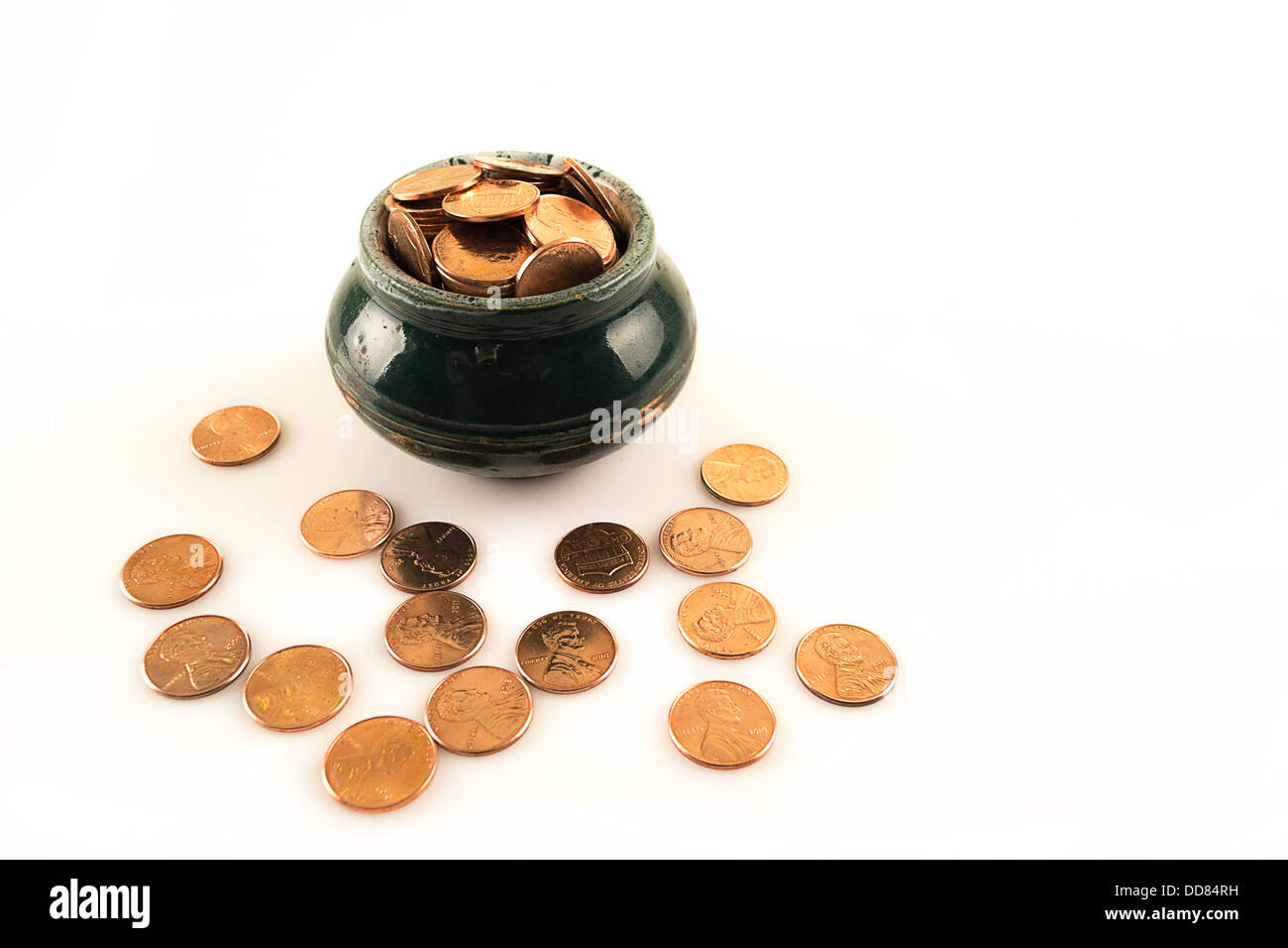 ceramic pot full of coins Stock Photo - Alamy