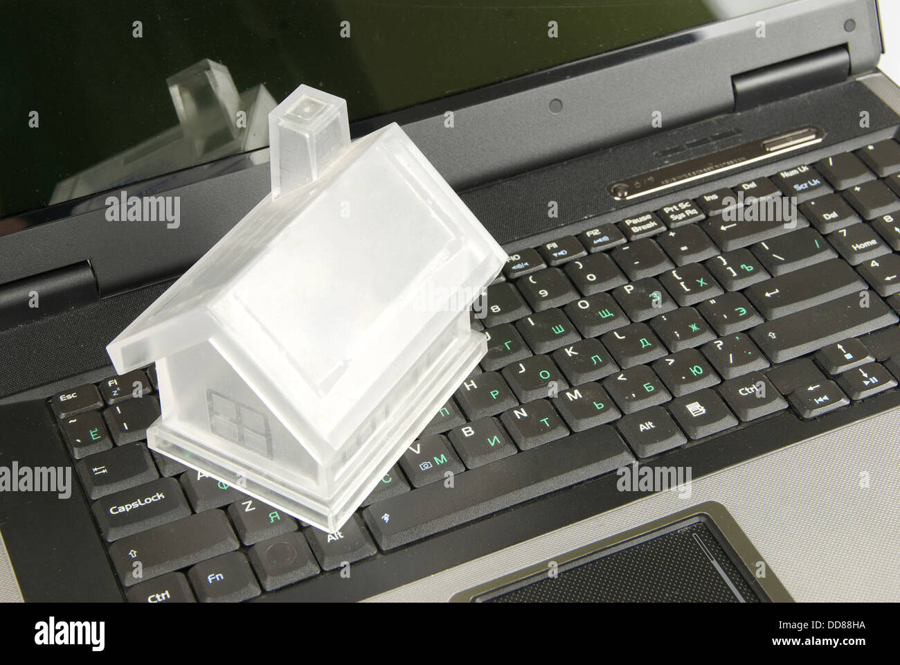 house on laptop Stock Photo - Alamy