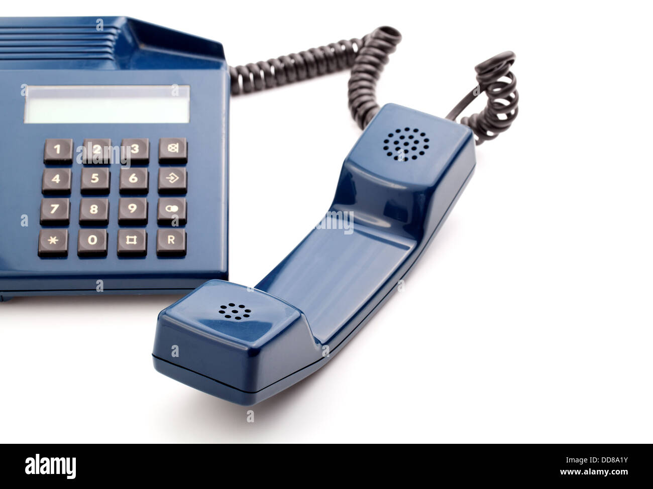 One blue telephone, isolated on white background Stock Photo - Alamy