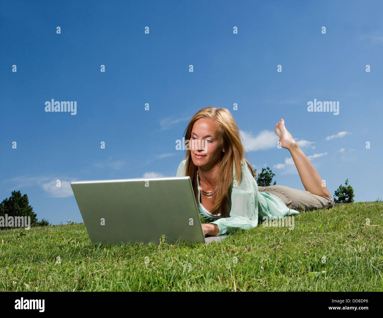 Woman with computer Stock Photo - Alamy