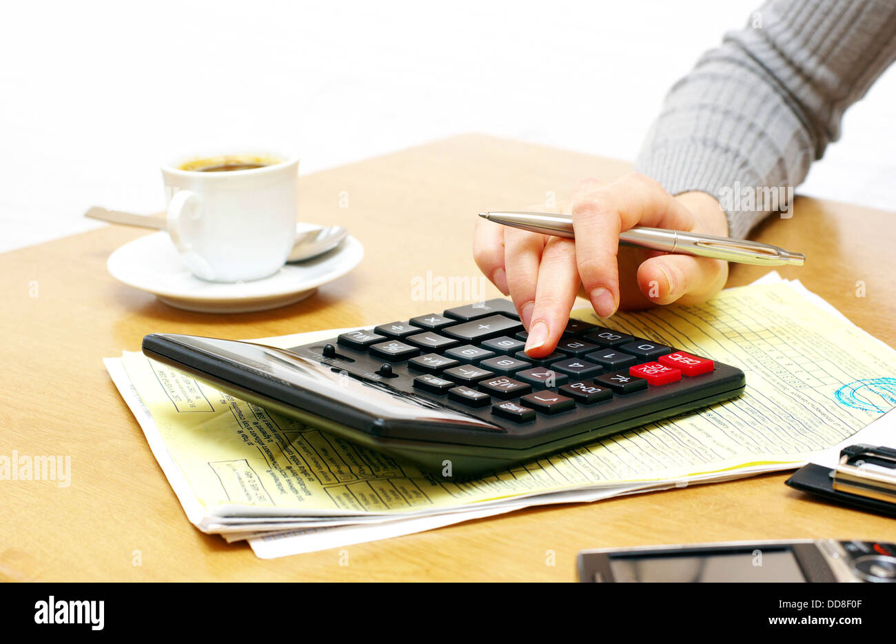 pen and calculator Stock Photo - Alamy