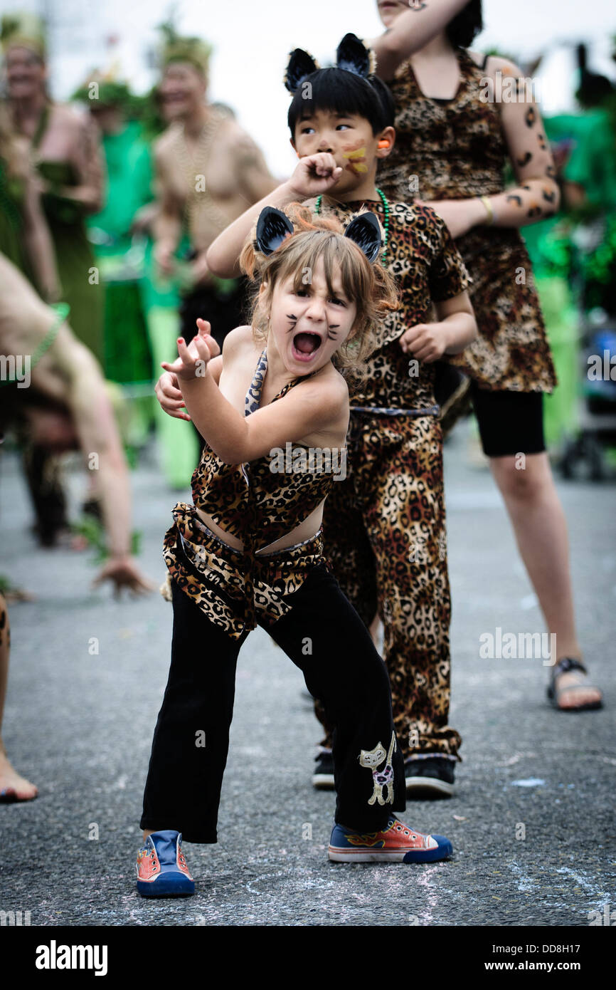 Seattle, Washington, USA. Fremont Solstice Parade. Children in leopard ...
