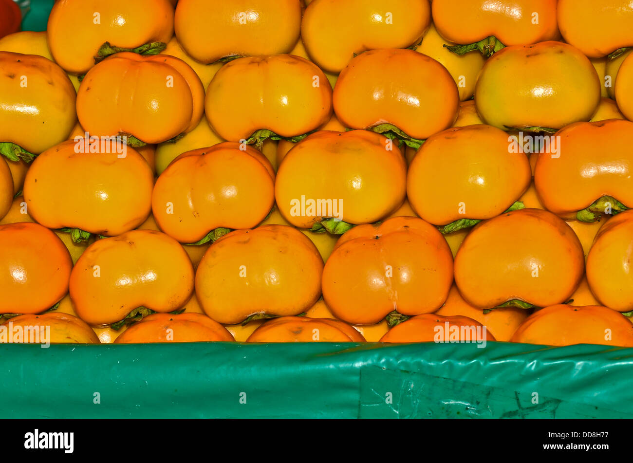 Red persimmon fruit hi-res stock photography and images - Alamy