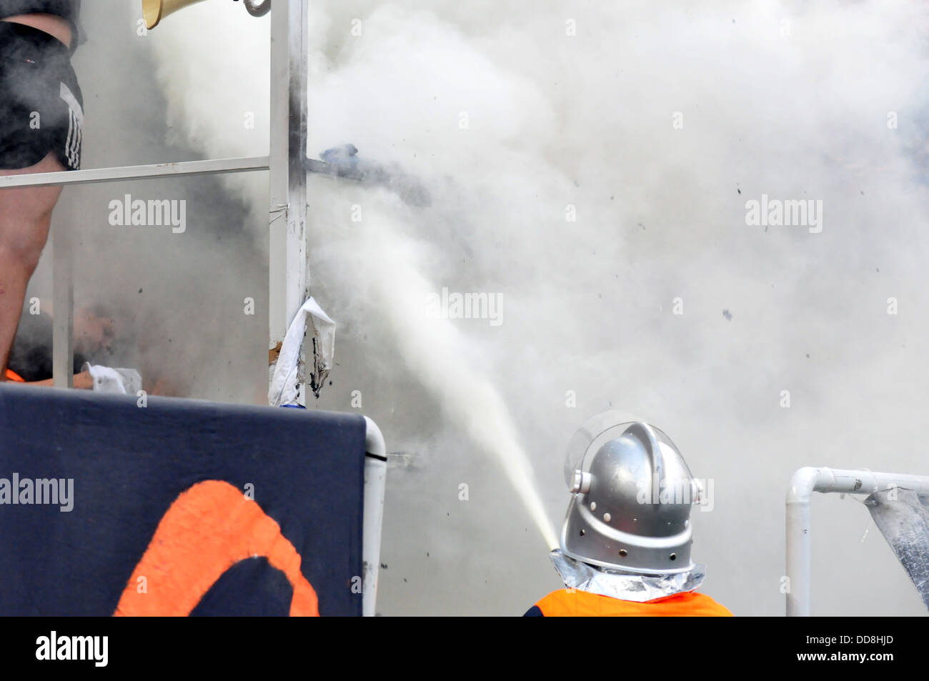 Extinguish burning scarves Stock Photo - Alamy