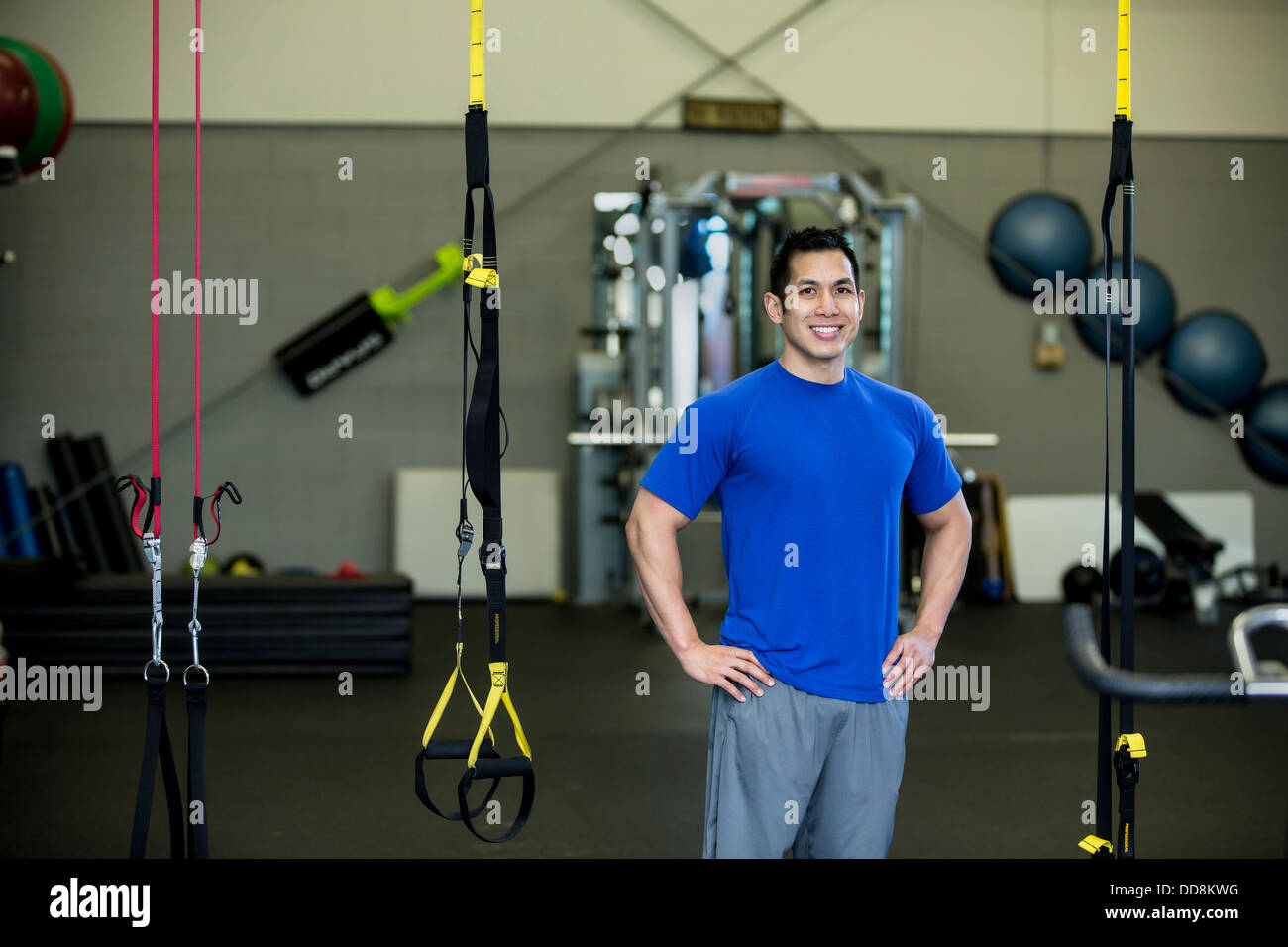 Pacific Islander man standing in gym Stock Photo - Alamy