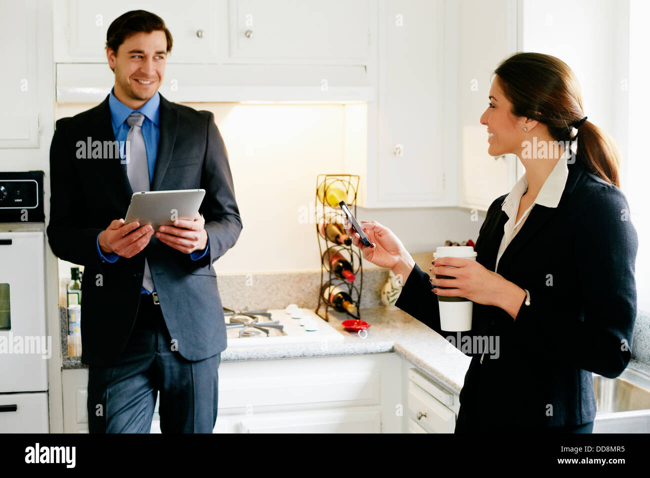 Business couple chatting drinking coffee hi-res stock photography and ...