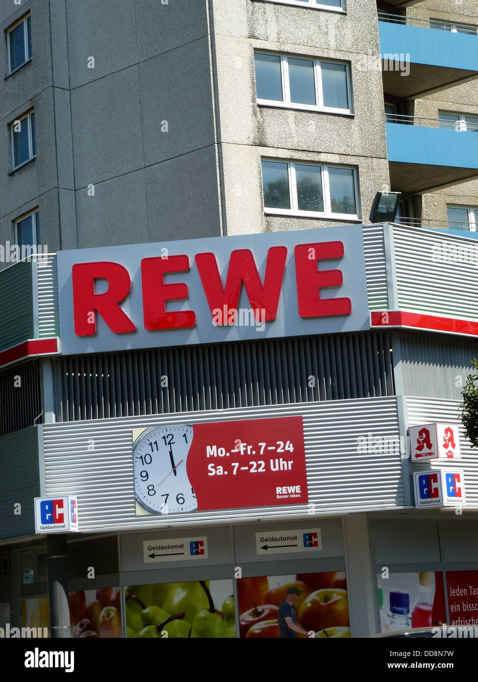 Logo of a REWE store with new opening hours, on 21 July 2013, in ...