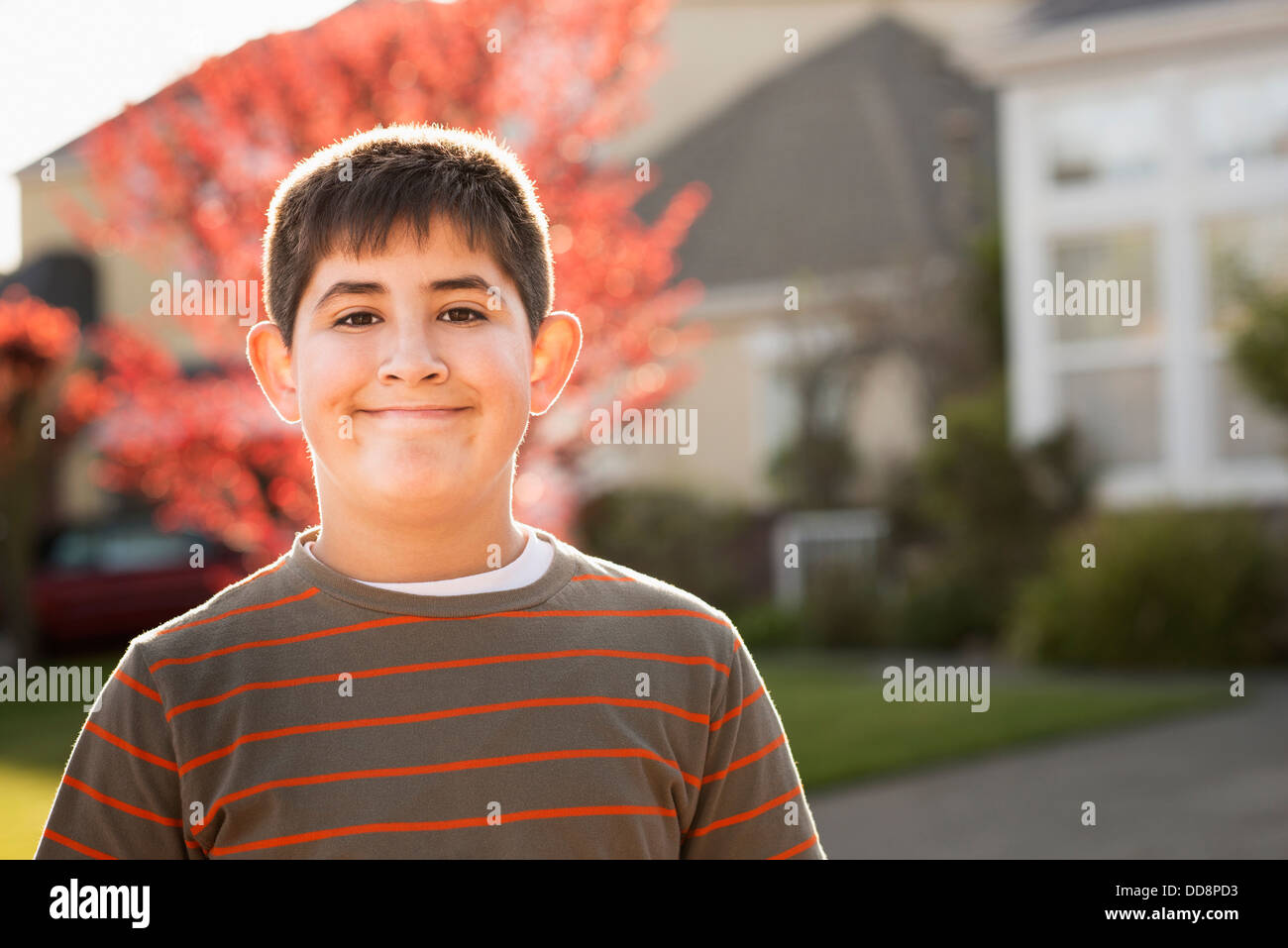 Hispanic boy smiling outdoors Stock Photo - Alamy