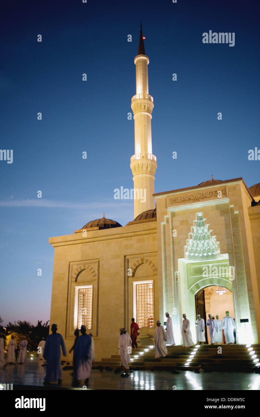 Omani moslems coming out of a mosque after the traditional evening ...
