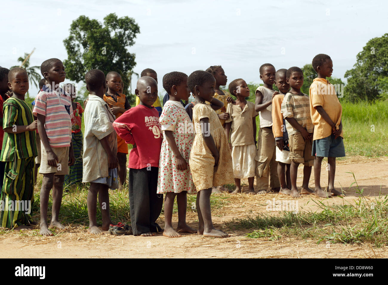 School kids standing outside, in line during during their sport classes ...