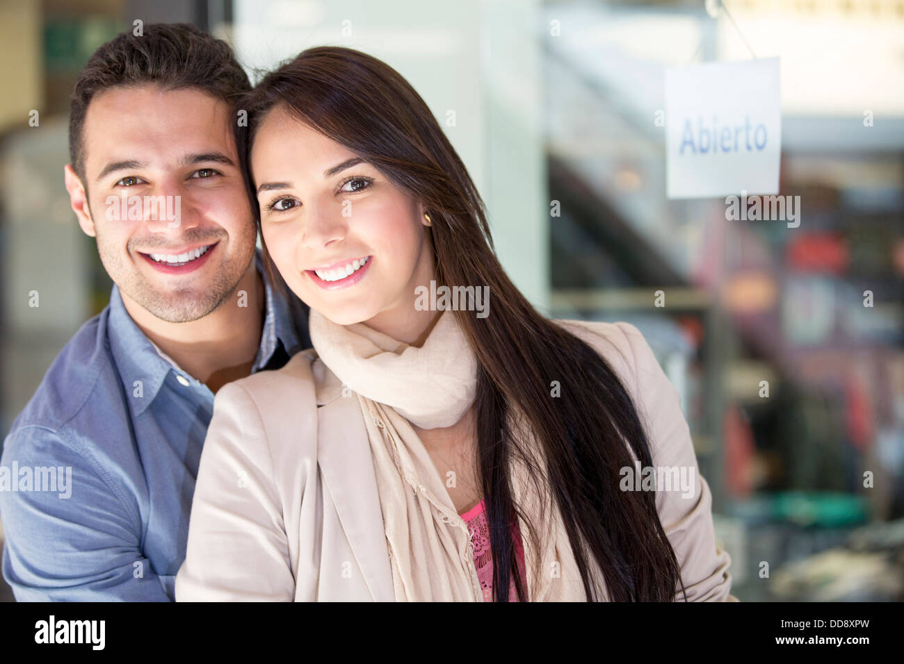 Hispanic couple smiling Stock Photo - Alamy