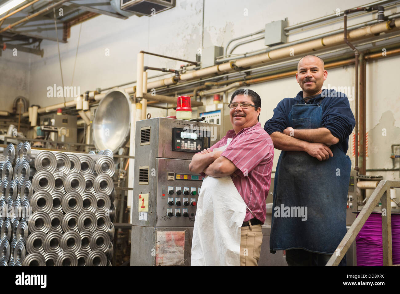 Happy textile factory worker hispanic hi-res stock photography and ...