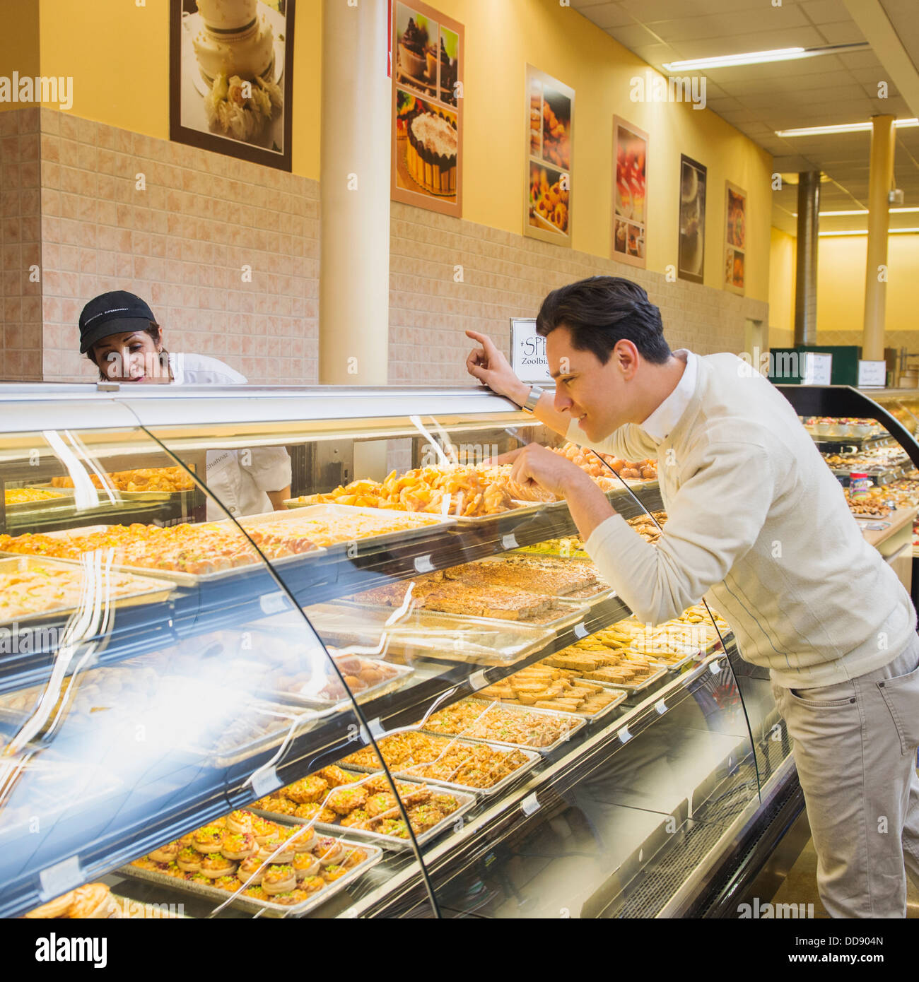 Customer ordering at restaurant counter Stock Photo - Alamy