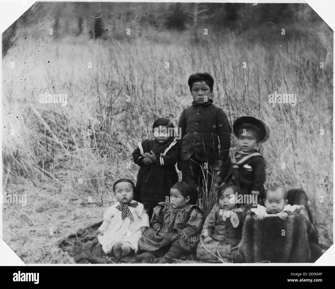 A photograph showing a group of Native American children, capturing ...