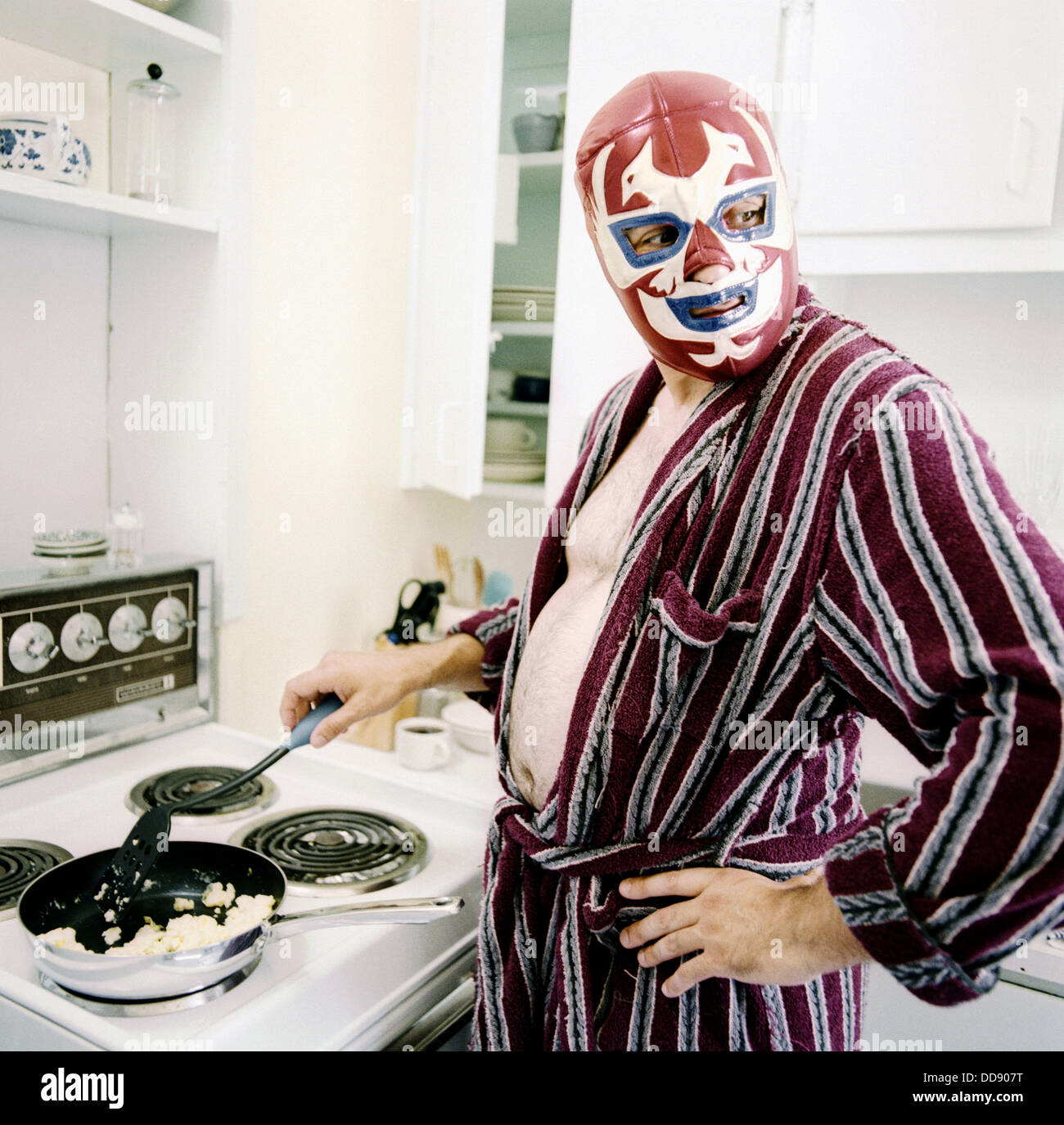 Wrestler in kitchen Stock Photo - Alamy