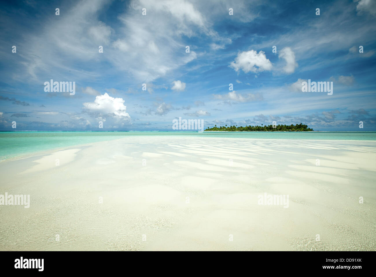 Maina atoll as seen from the white sandy beach of the desert Honeymoon ...