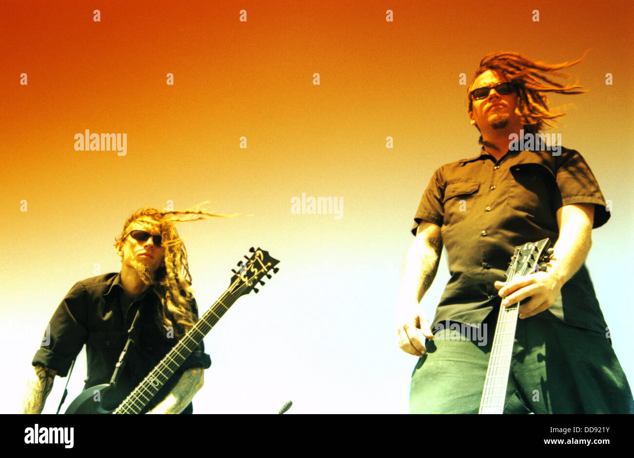 Alternative musicians with guitars Stock Photo - Alamy