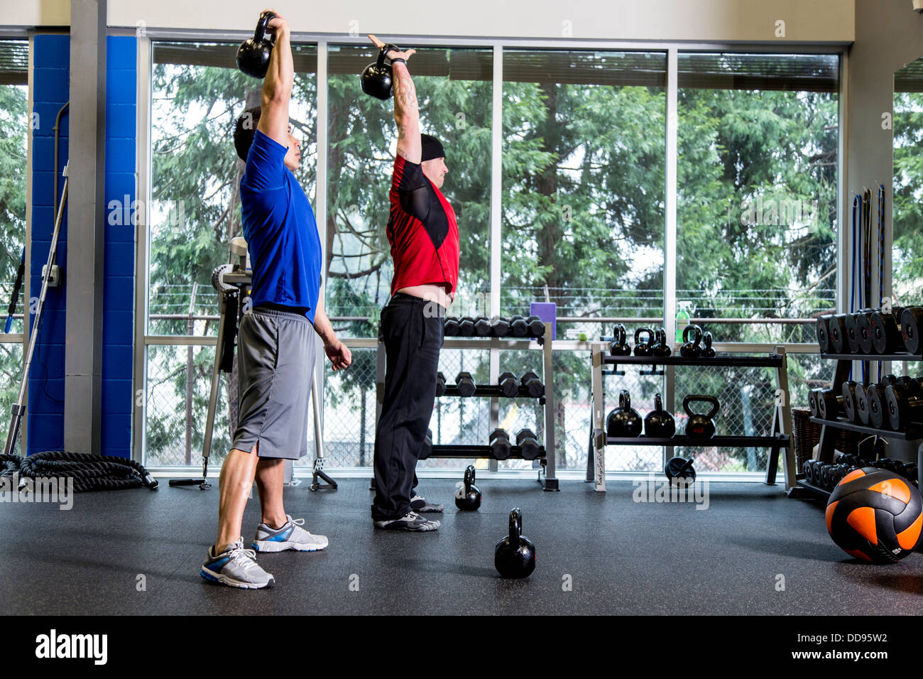 Men working out in gym Stock Photo - Alamy