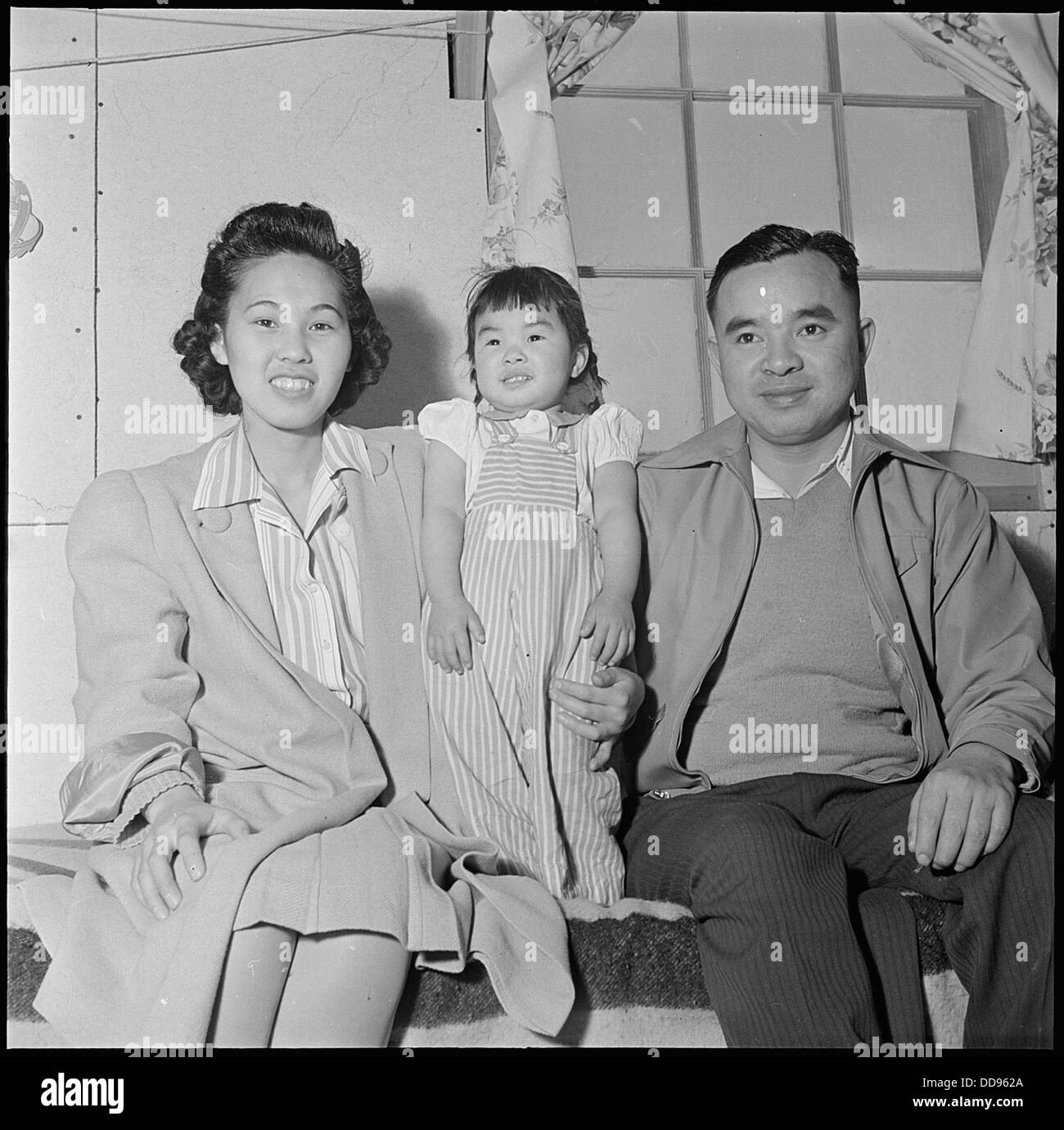 A photograph of Dave and Ruth Nitake with their daughter at the Heart ...