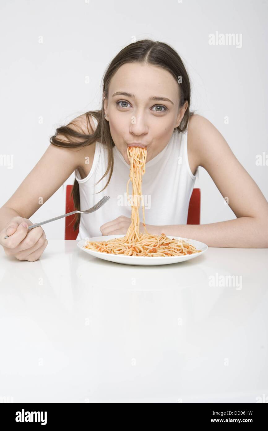Woman Eating Spaghetti Stock Photo - Alamy