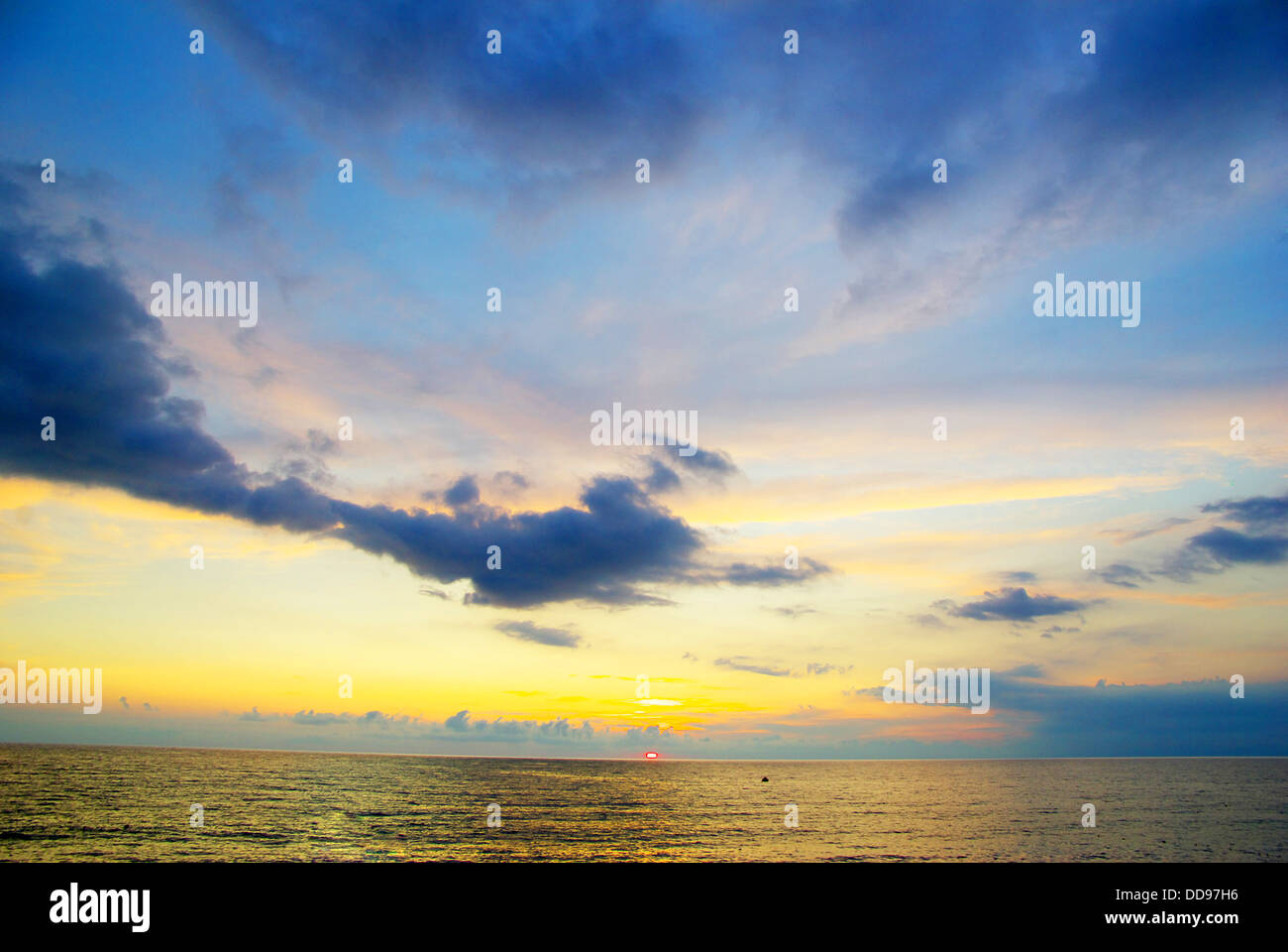 sunset over the sea Stock Photo - Alamy