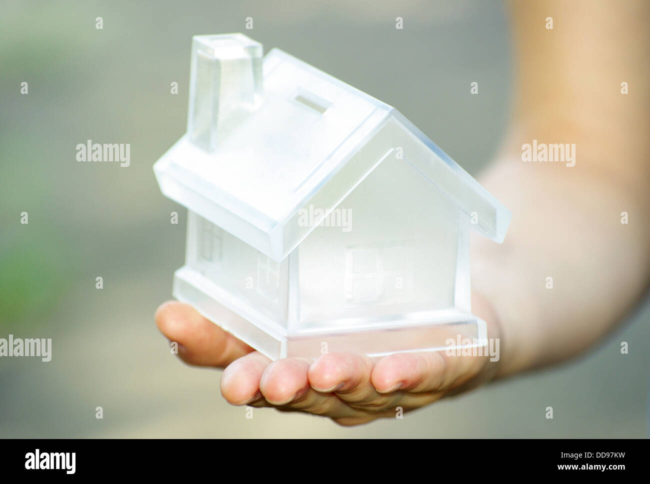 house in hand Stock Photo - Alamy