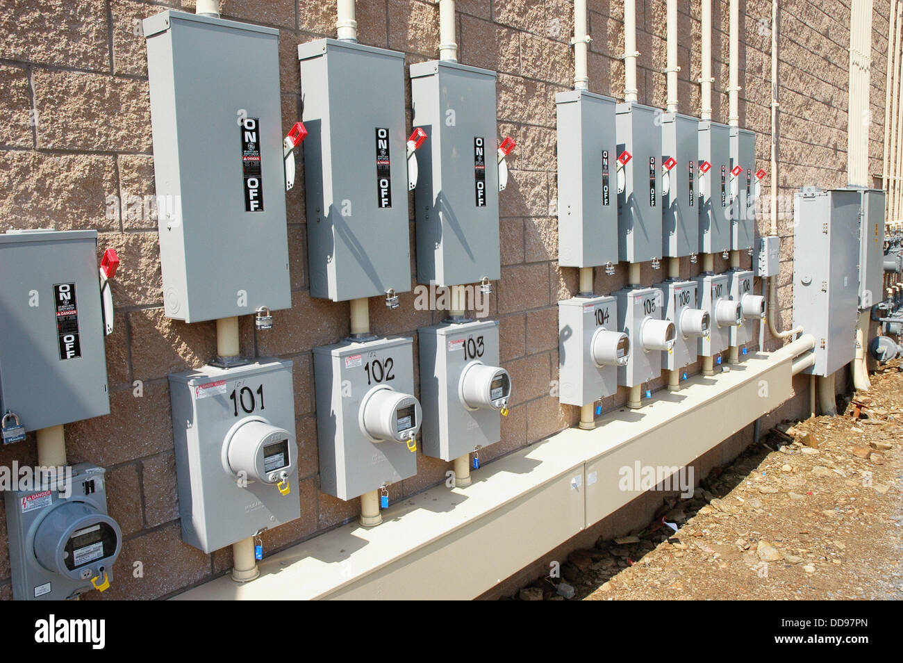 Power meters for new strip mall stores doing business Stock Photo - Alamy