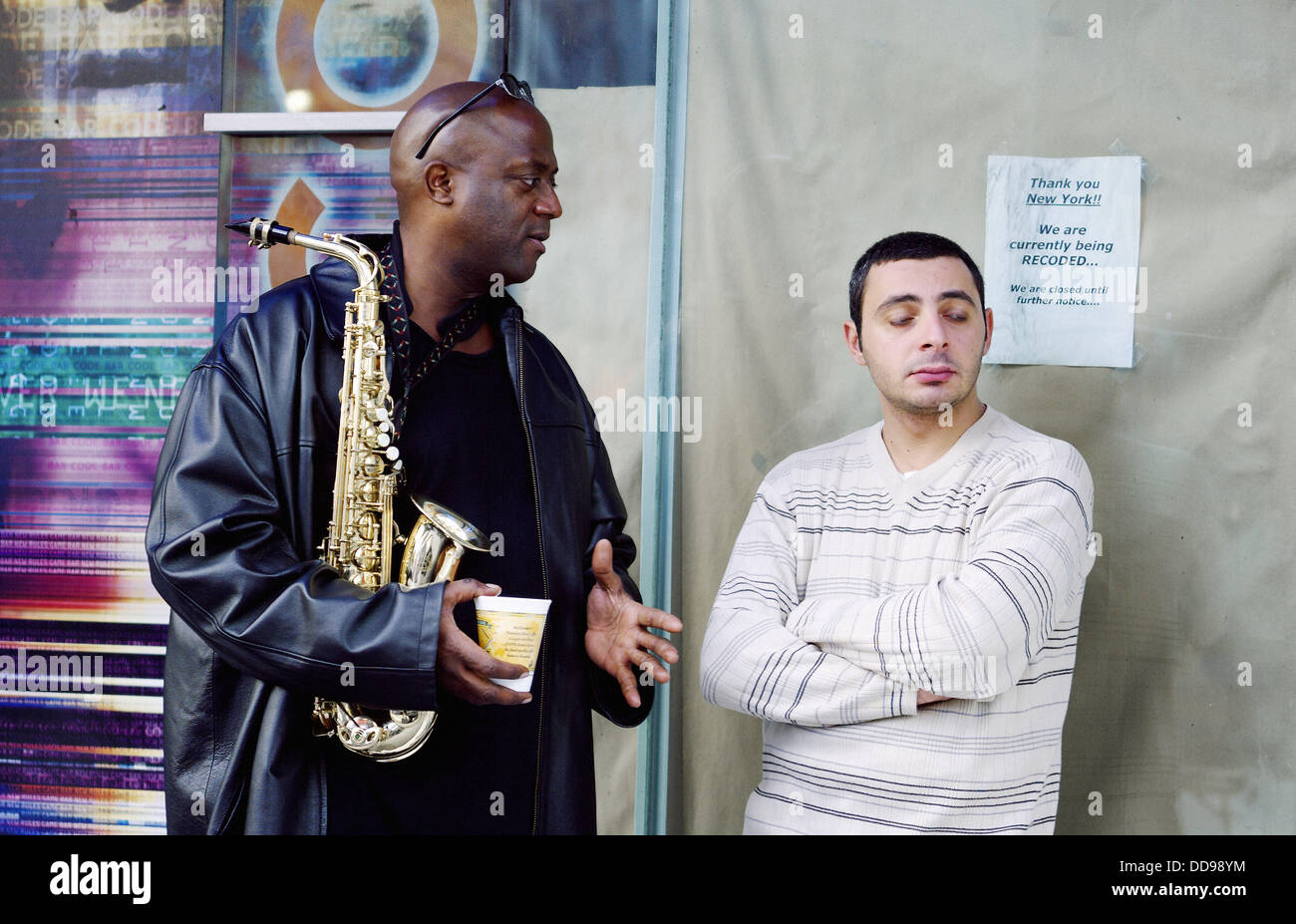 Two men having a conversation in Times Square. New York City. USA Stock ...