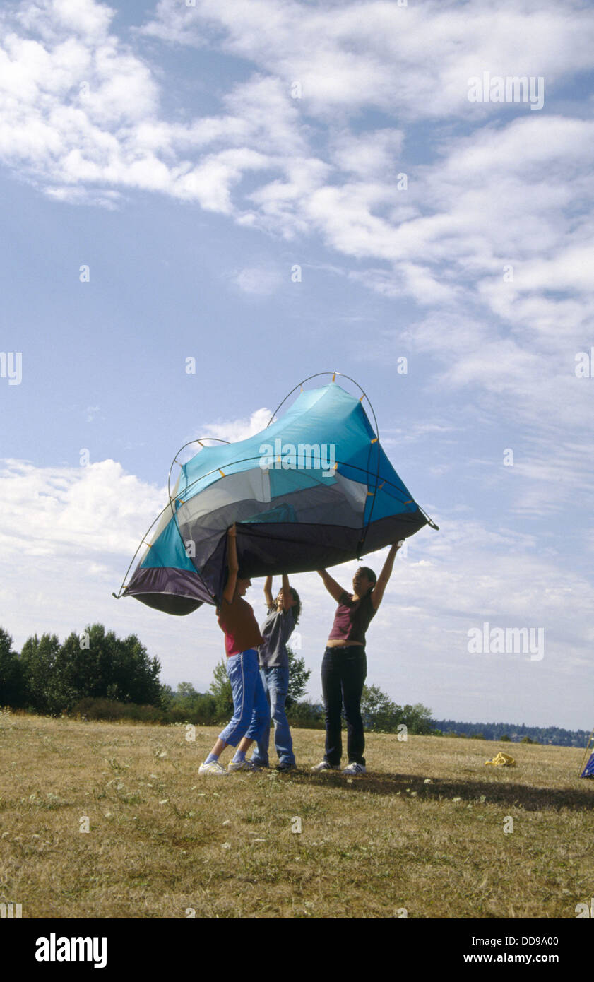 Girls setting up tent hi-res stock photography and images - Alamy