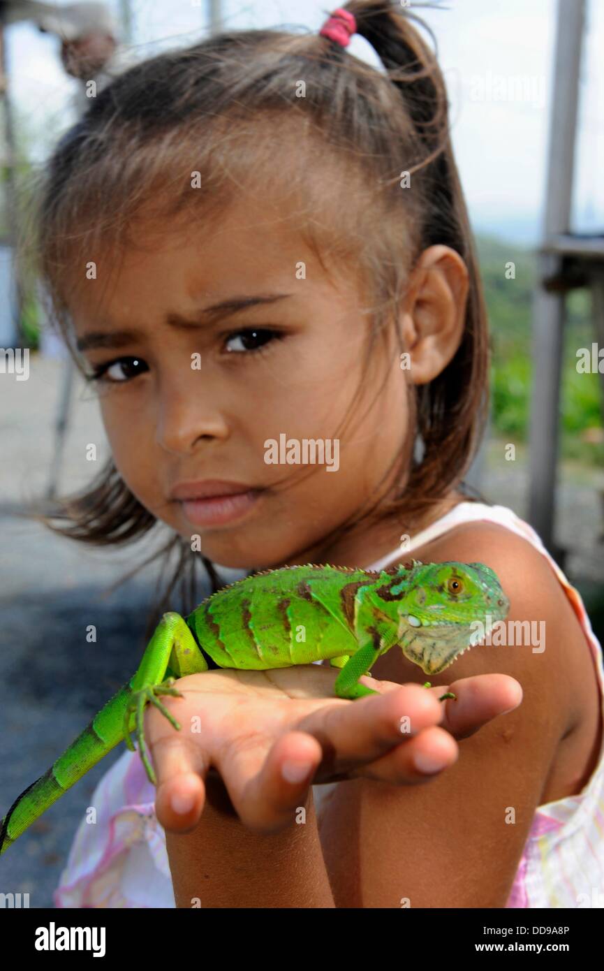 Young native Honduran girl with chameleon Isla Roatan Honduras Central ...