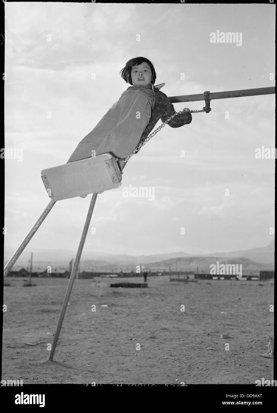 This photograph shows a young student at the Heart Mountain Relocation ...