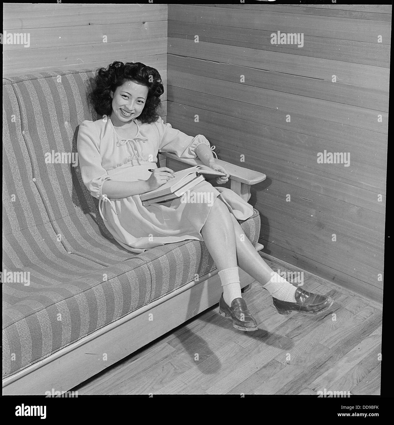 Pretty Hideko Takehara, an 18-year-old evacuee, photographed at the Heart Mountain Relocation ...