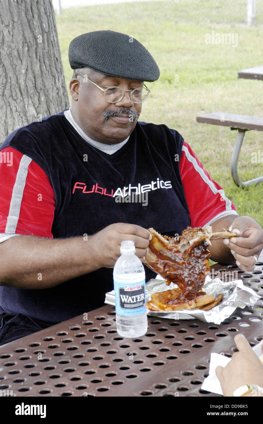 Man eating at NAACP field day. Port Huron. Michigan, USA Stock Photo ...