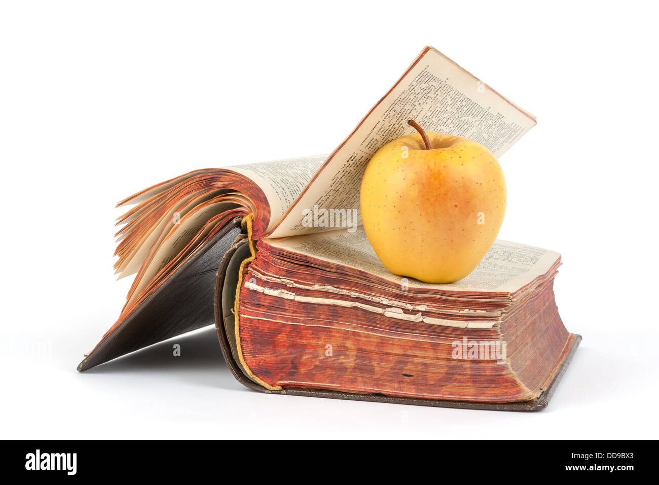 Old book and apple Stock Photo - Alamy