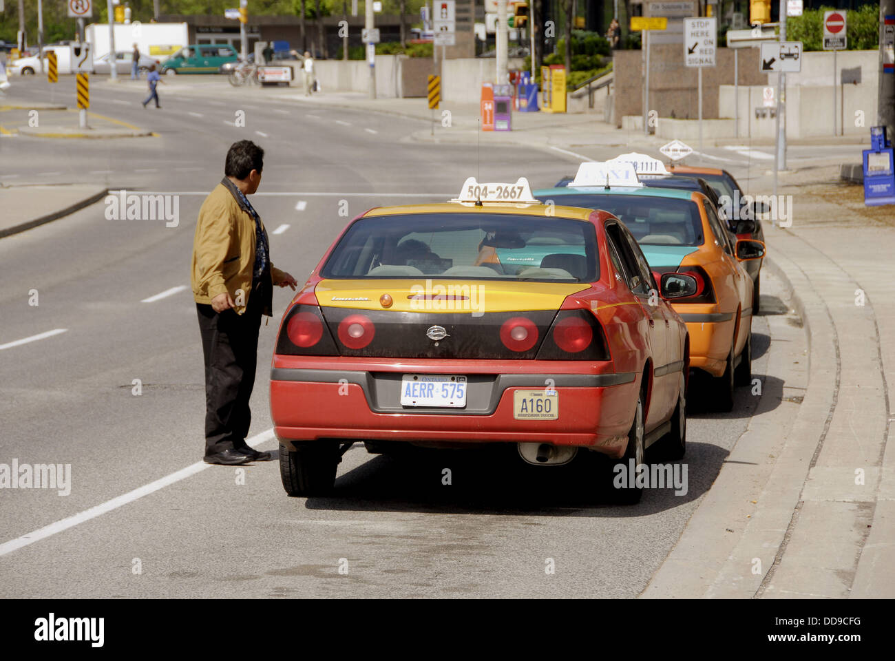 Taxi cabs line up outside a subway station in Toronto Ontario Canada ...