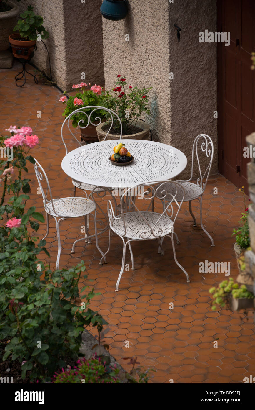A setting for the idyllic French lunch - table and chairs in Carcasonne ...