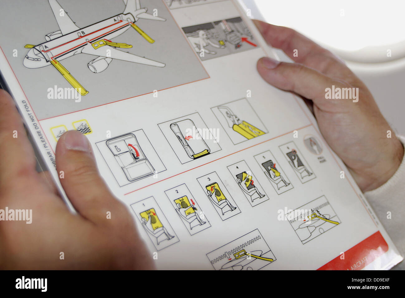 Airline safety instructions Stock Photo - Alamy